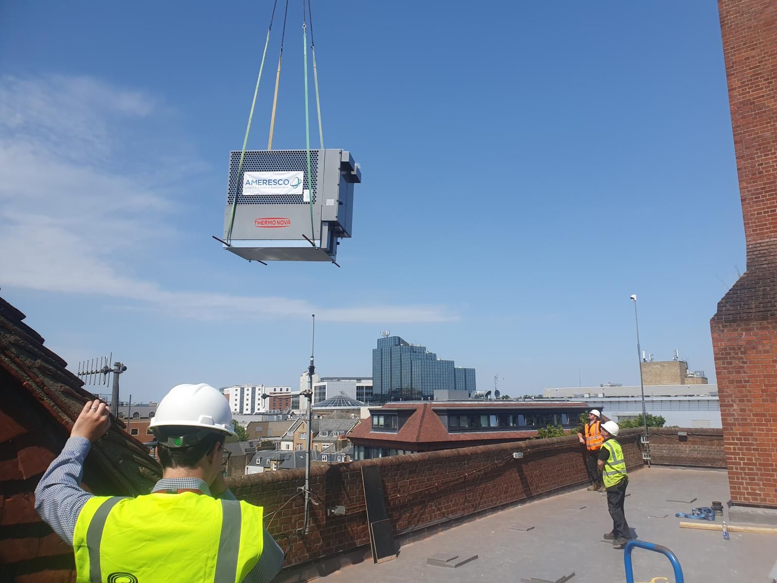 10 tonnes of heat pumps lifted onto grade two listed roof | Salix Finance